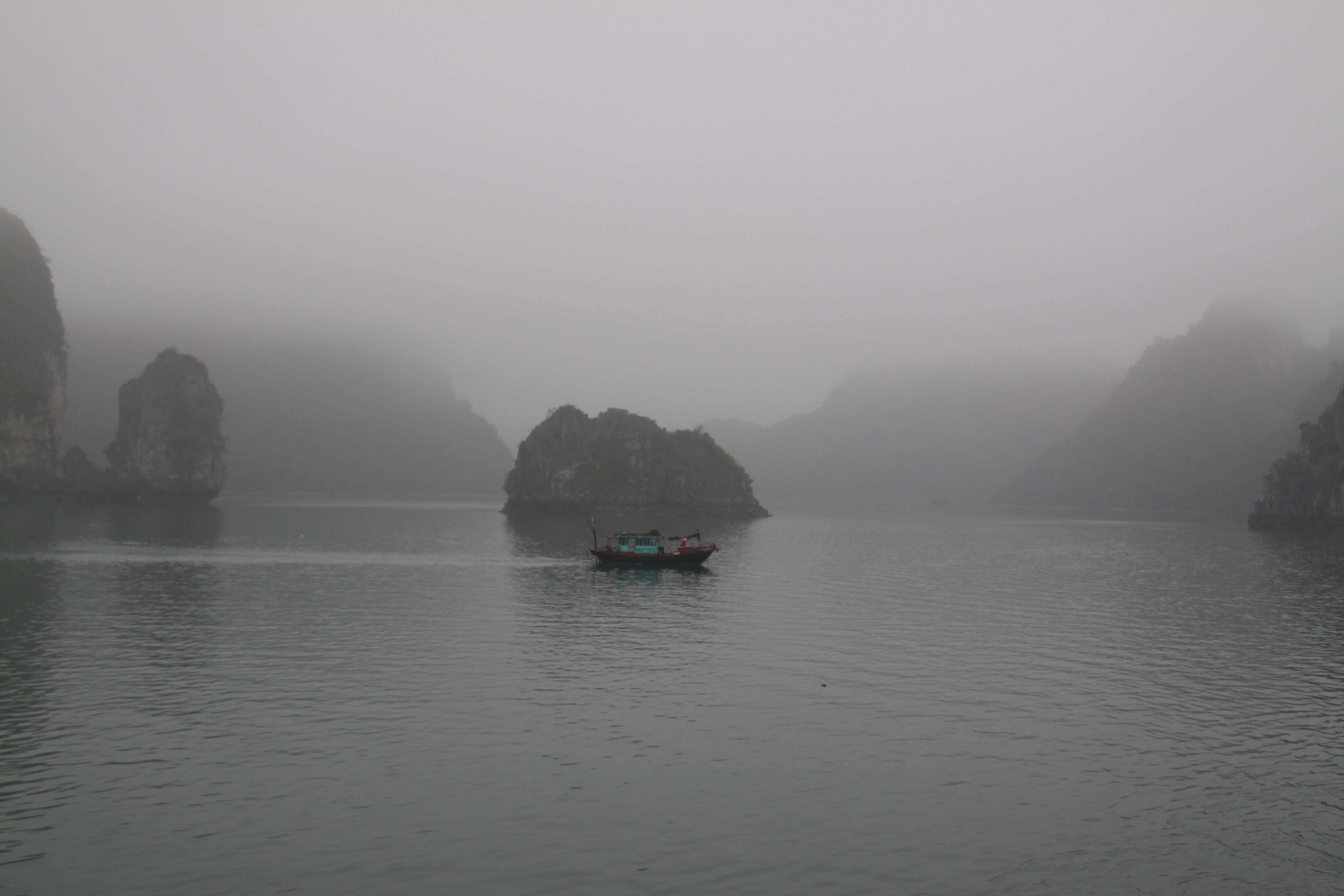 Vietnam Boat in Mist on Ha Long Bay – Rene Navarro